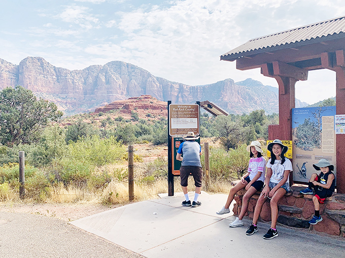 Information central: where dreams and reality meet. Those kids are already plotting which trail will tire out the adults first.