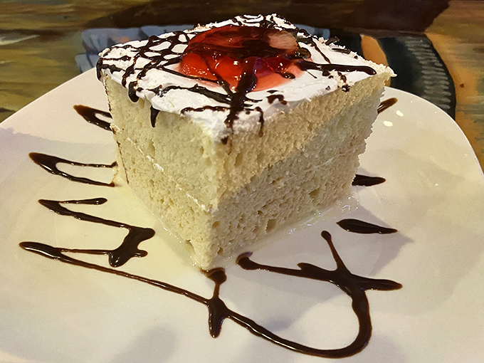 Tres leches cake so light and dreamy it's like eating a cloud that somehow got drenched in sweet milk.