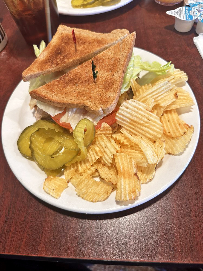 The sandwich that launched a thousand lunch breaks. Perfectly toasted bread creating that satisfying crunch that echoes through the diner when you take that first bite.