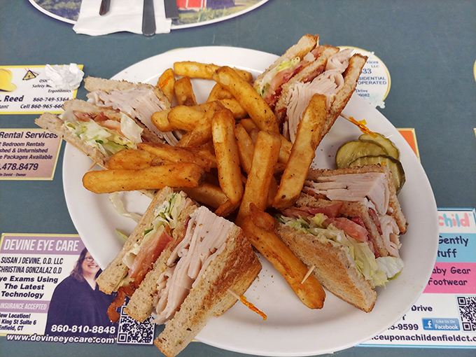 The architectural marvel known as a club sandwich&mdash;layers of turkey, crisp vegetables, and toast secured with those fancy toothpicks that make you feel sophisticated.