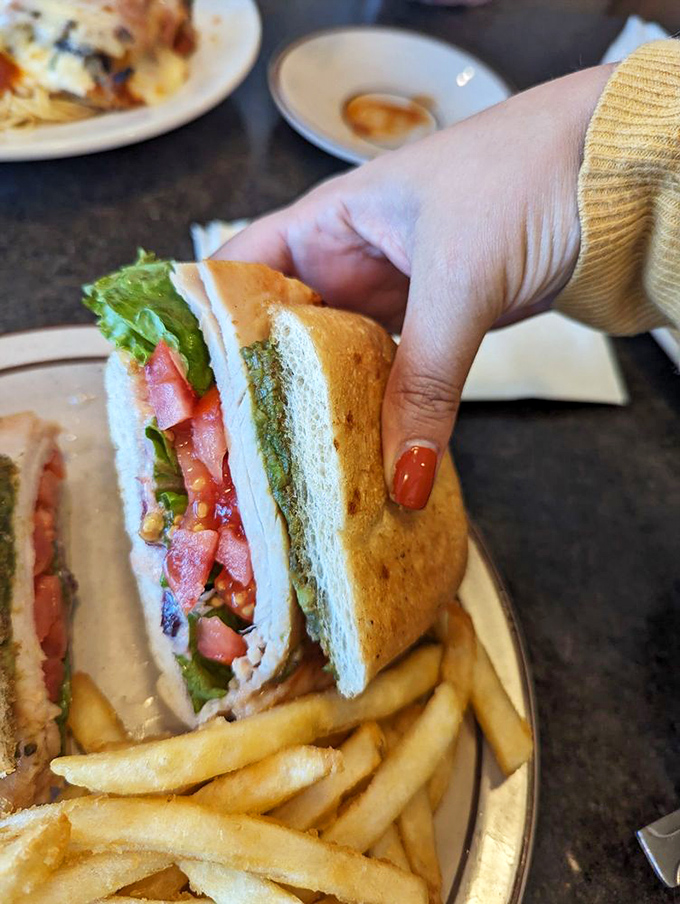 This isn't just a sandwich&mdash;it's architecture. Layers of fresh ingredients stacked between bread with the structural integrity to hold it all together.