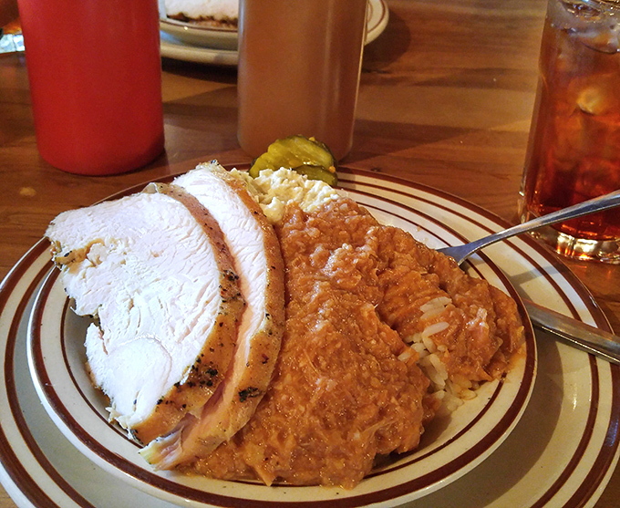 Sliced turkey that proves poultry deserves its place in the barbecue pantheon, flanked by hash that's worth crossing state lines for.