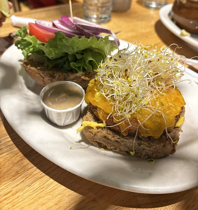 This veggie burger doesn't apologize for not being meat—it stands proudly as its own achievement of flavor and texture.