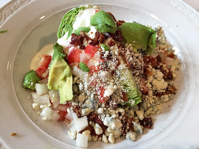 A wedge salad that proves vegetables can be decadent too &ndash; loaded with enough toppings to make you temporarily forget about those burgers.