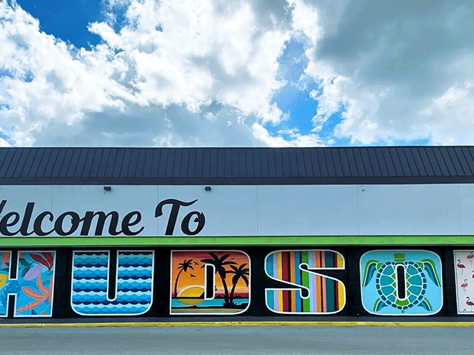 The "Welcome to Hudson" sign promises Florida paradise without the fine print of tourist traps or overcrowded beaches.
