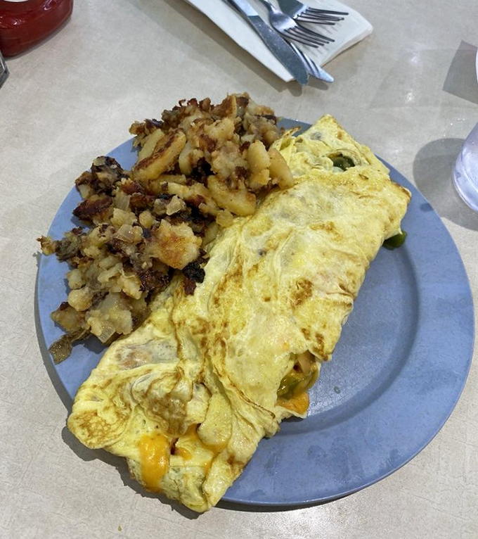 The Western omelet sprawls across the plate like manifest destiny, but with better results and melted cheese.