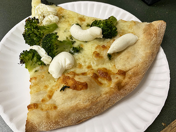 White pizza with broccoli and ricotta—proof that vegetables on pizza can be a revelation rather than a compromise.