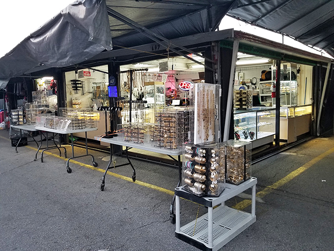Jewelry displays gleam under the lights, a treasure chest without the inconvenience of pirate battles. Accessories for every occasion line these tables.