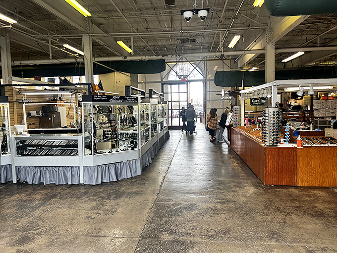 The market's indoor corridors offer climate-controlled treasure hunting. No sunburn required for these serious shoppers on their quest for the perfect find.