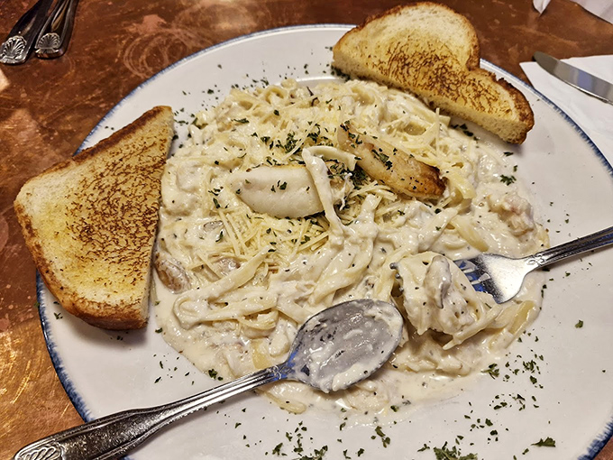 Pasta that would make an Italian grandmother nod in approval—creamy, generous, and paired with perfectly toasted bread for sauce-sopping duty.