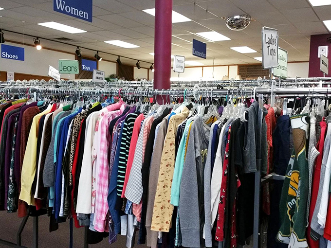 The women's clothing section: organized chaos where vintage treasures hide between everyday finds, like sartorial Easter eggs waiting to be discovered.