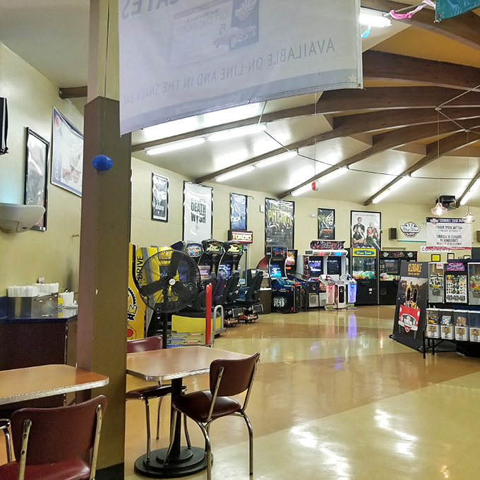 The arcade glows with retro charm – where quarters still matter and high scores are eternal.