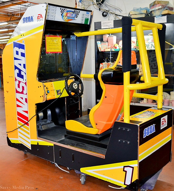 A vintage NASCAR arcade game stands ready to fulfill childhood dreams you forgot you had until this very moment.
