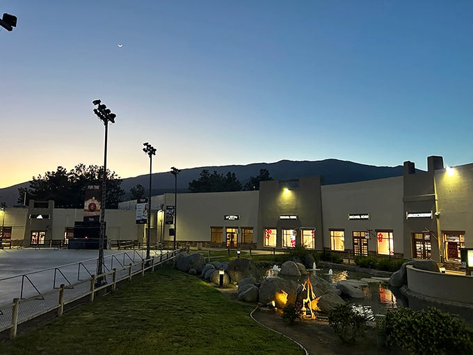 As twilight falls, the outlet center glows with possibility &ndash; and the knowledge that nighttime shopping burns just as many calories.
