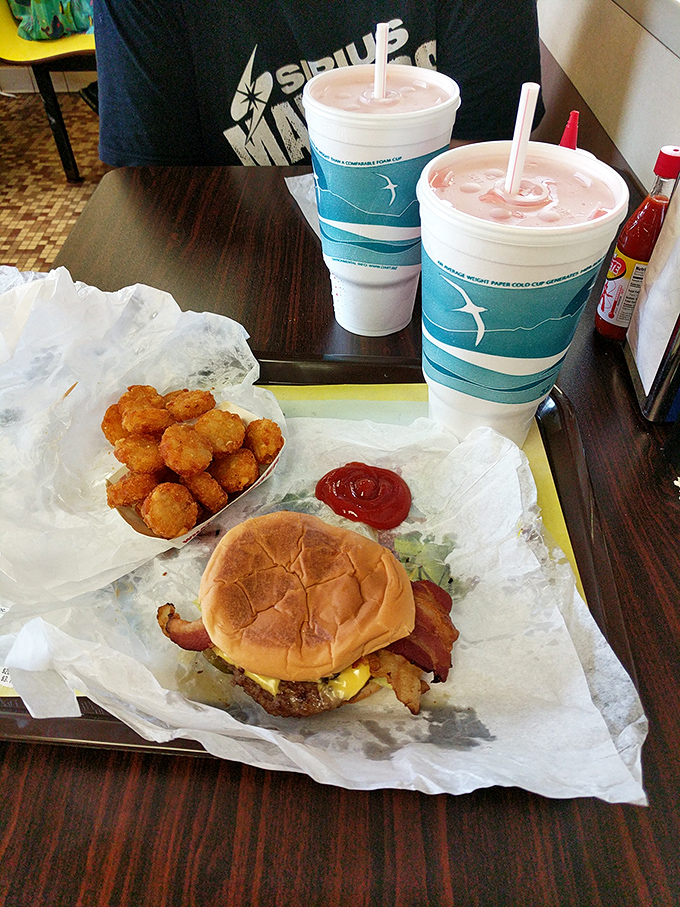 The breakfast of champions looks suspiciously like lunch. Bacon, burger, and cheese—the holy trinity of "I'll start my diet tomorrow" cuisine.