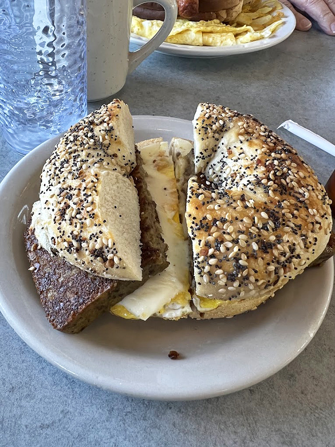 This isn't just a bagel sandwich&mdash;it's an engineering marvel of seeds, eggs, and meat that demands to be tackled with both hands.