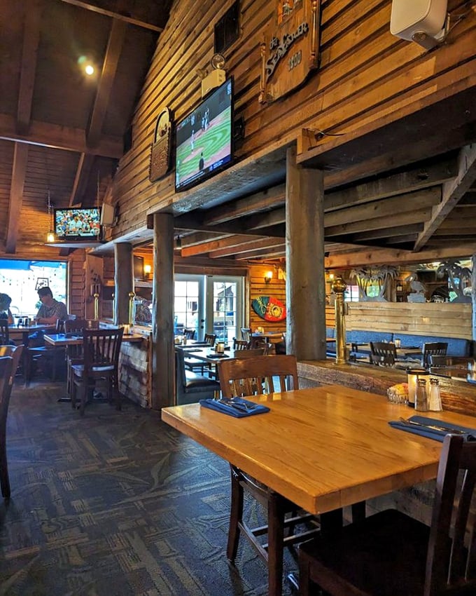 The bar area balances rustic charm with sports-watching practicality—proof that you can enjoy both championship seafood and championship games simultaneously.