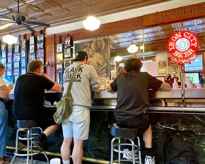 The counter seating offers front-row views to culinary history in action. Where else can you watch decades of tradition unfold?