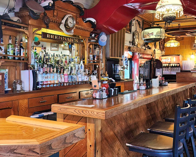 The bar area combines rustic charm with maritime flair. Those wooden surfaces have absorbed decades of laughter, stories, and the occasional spilled beer.