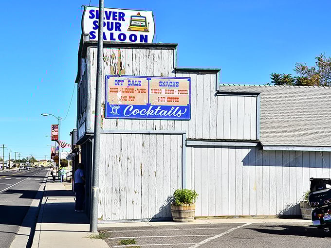 The Silver Spur Saloon's weathered sign speaks to Fernley's authentic Western roots&mdash;no Disney version here, just the real deal.