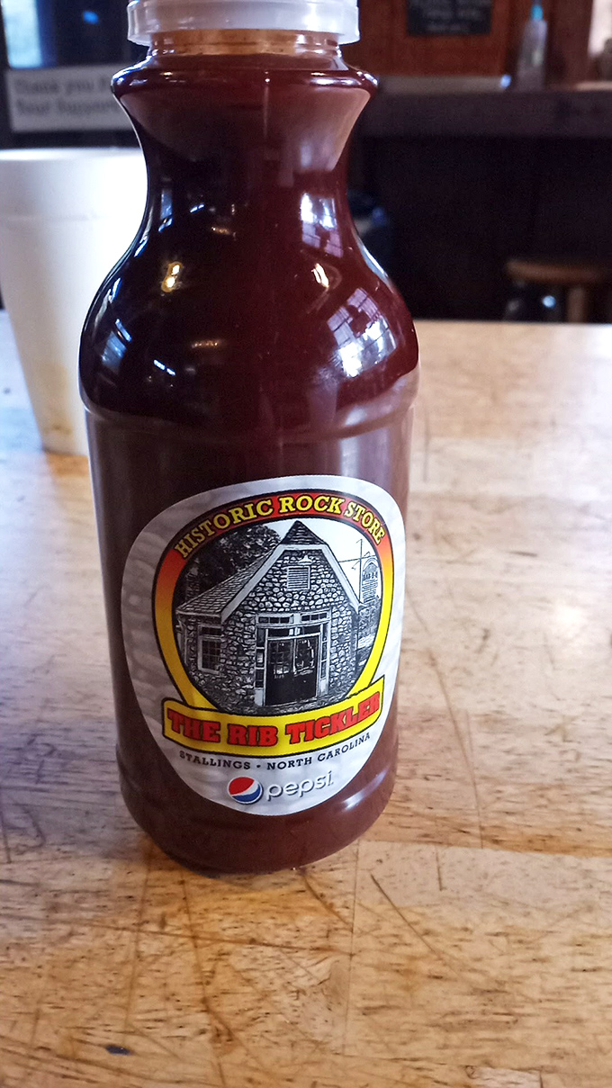 Liquid gold in a bottle! Their house sauce carries the perfect balance of vinegar tang and tomato sweetness—North Carolina tradition in every drop.