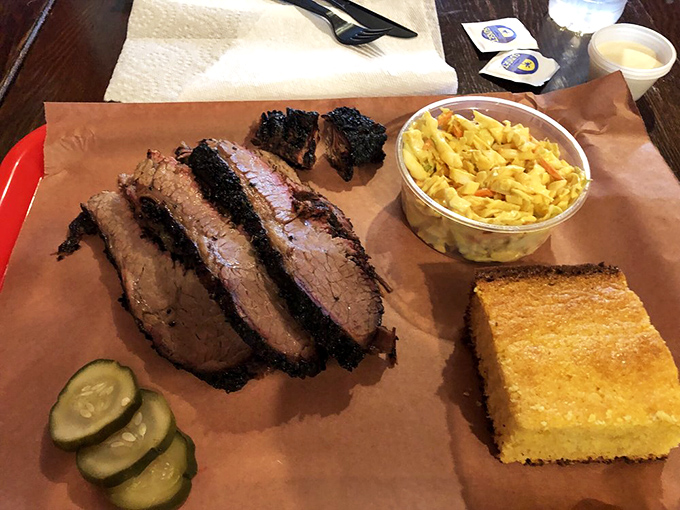 Brisket with a smoke ring so hypnotic you might need a moment of silence before diving in&mdash;this is meat meditation at its finest.