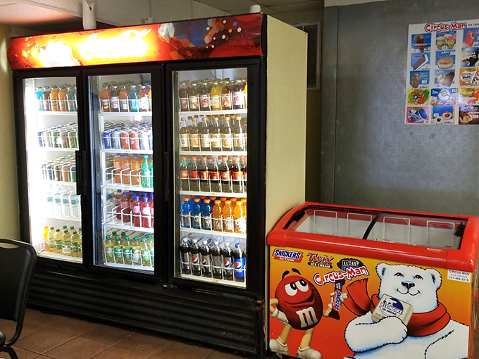 The beverage coolers stand ready like loyal hydration stations. After all, fighting over the last hush puppy is thirsty work.