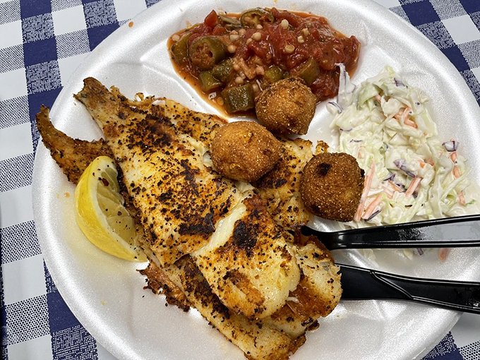Blackened fish that's not burnt&mdash;it's character-building. That lemon wedge isn't garnish; it's the perfect high note in this seafood symphony.