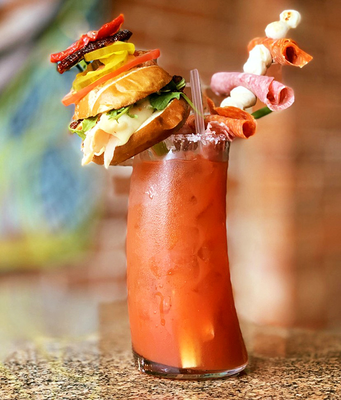 Not just a Bloody Mary, but a portable feast&mdash;where your drink comes accessorized with a sandwich hat and meat jewelry that makes brunch infinitely more exciting.