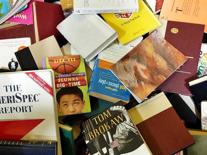 Books piled high like literary bargains, where every spine promises adventure for less than a fancy coffee drink costs.