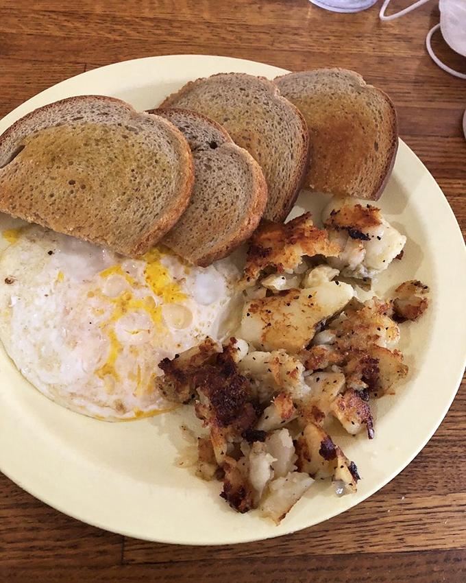 Simple perfection on a plate&mdash;eggs, toast, and home fries that remind you why breakfast classics never needed a trendy makeover in the first place.