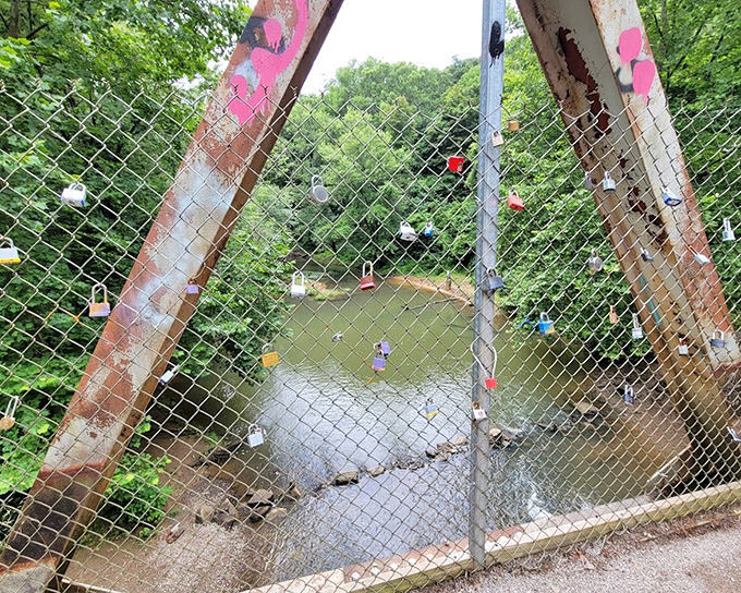 Love locks adorn the bridge fencing&mdash;modern tokens of affection in a place where ghost stories and history intertwine.