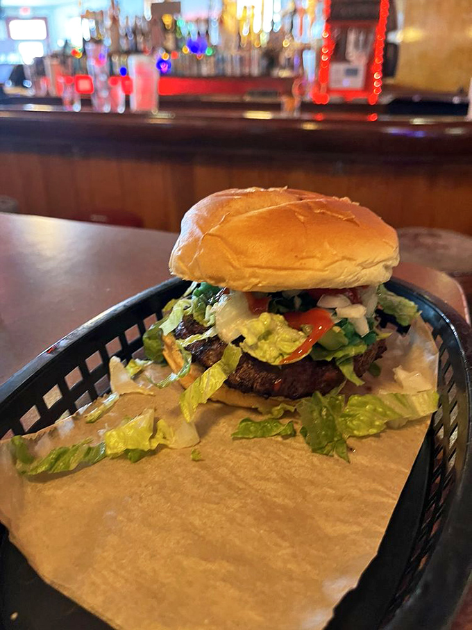 Even the burgers demand attention at this hot dog paradise. This leafy, loaded beauty proves Happy Dog isn't a one-trick pony.