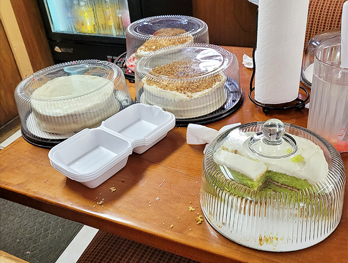 Dessert heaven under glass domes. These cakes aren't waiting for a special occasion—they ARE the special occasion.