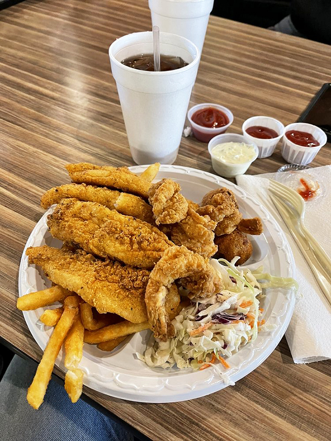 A seafood platter that would make coastal restaurants jealous &ndash; golden catfish and plump shrimp with the kind of crunch that echoes in your dreams.