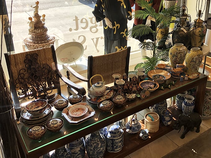 Asian-inspired ceramics and decorative pieces create a museum-worthy display that would make any home feel instantly more cultured and sophisticated.