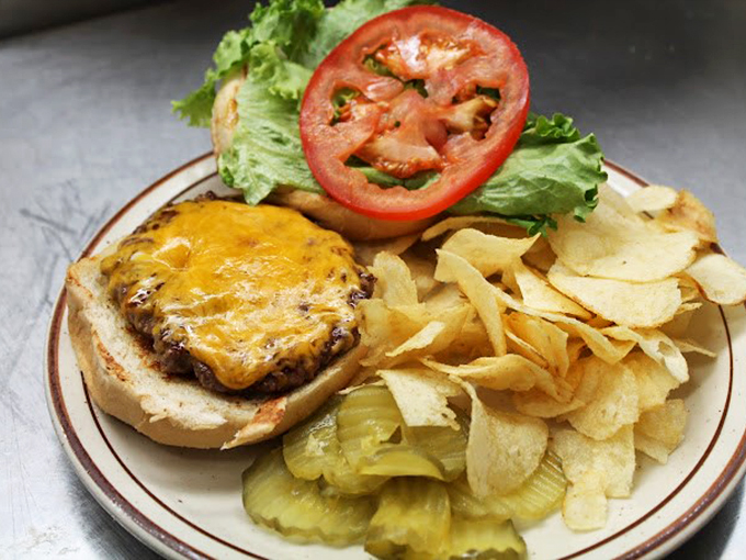 A cheeseburger that doesn't need fancy aioli or artisanal buns to be spectacular. Those house-made pickles deserve their own fan club.