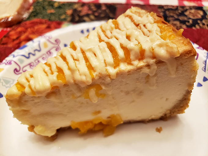 Peach cheesecake: where creamy decadence meets fruity sweetness. The perfect finale to a seafood symphony, with drizzles playing visual harmony.