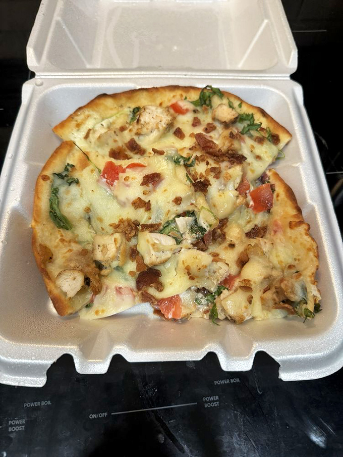 This flatbread pizza in its to-go container proves that even The Swire's takeout deserves its own glamour shot.