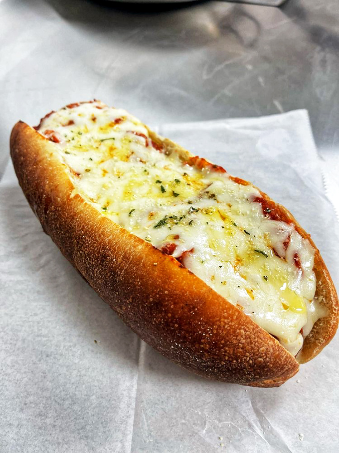 This chicken parm sandwich isn't messing around. Golden bread, melted cheese, and enough comfort to make your grandmother nod in approval.