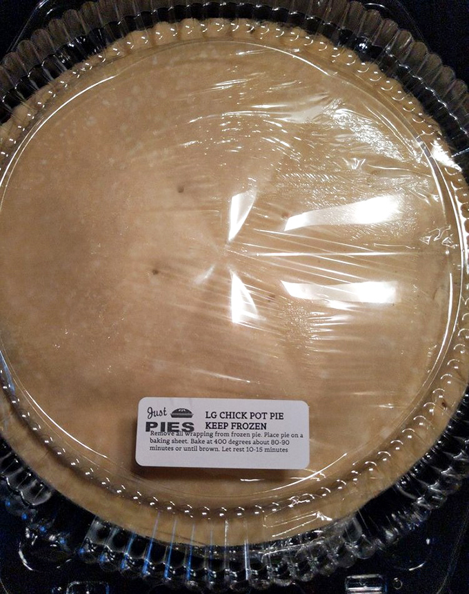 Beneath this golden dome lies a savory treasure of chicken and vegetables. Comfort food that hugs you from the inside out.