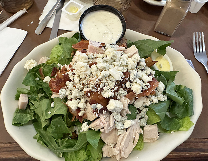 A salad that doesn't apologize for being healthy &ndash; with enough bacon, cheese, and chicken to make your cardiologist nervously adjust their tie.