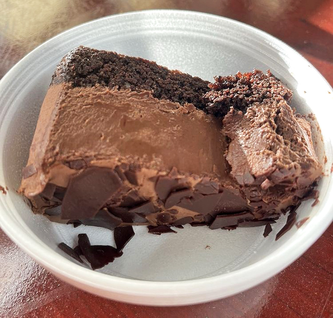 This chocolate cake doesn't need a fancy French name - it's the kind of dessert that makes you close your eyes and forget your manners.