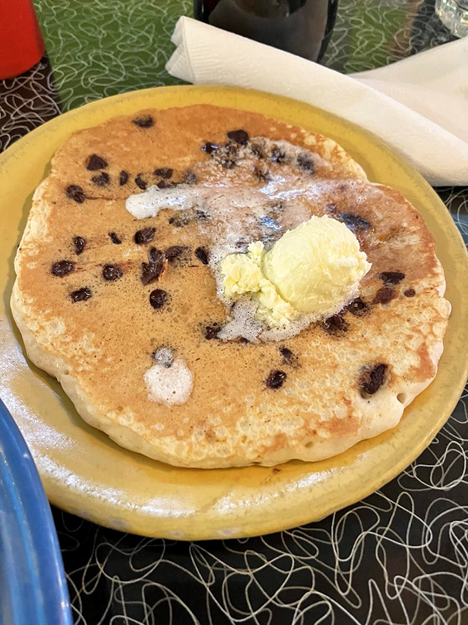 This chocolate chip pancake isn't just breakfast&mdash;it's dessert with permission, complete with a melting butter crown.