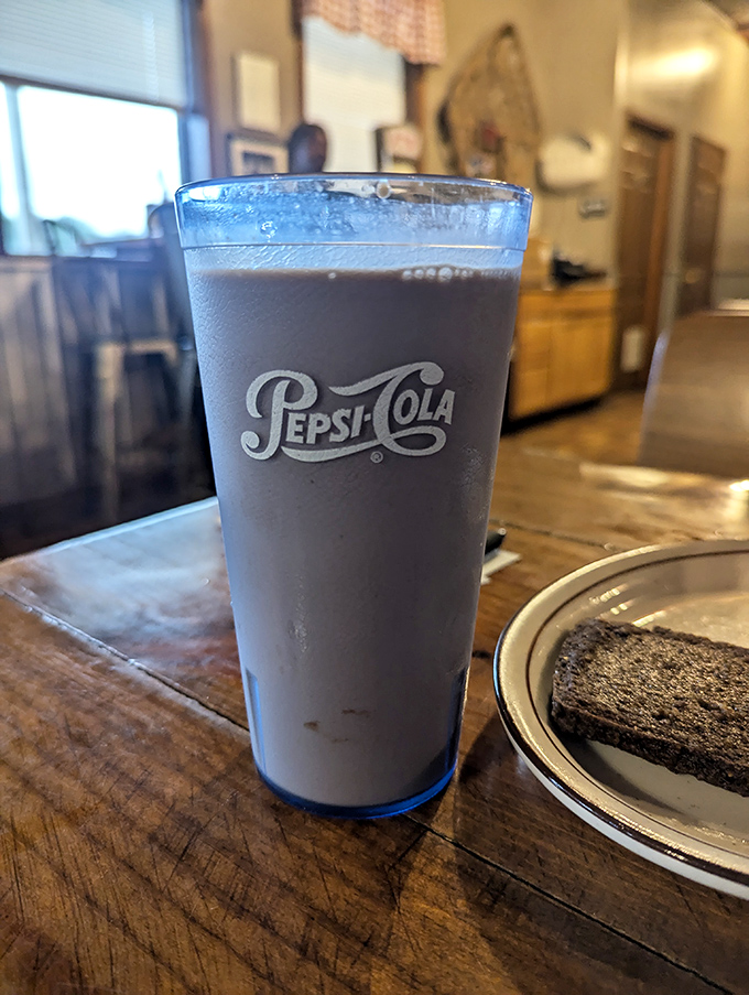 That blue Pepsi glass isn't just holding a drink &ndash; it's holding memories of simpler times when soda fountains were social hubs and calories didn't count.