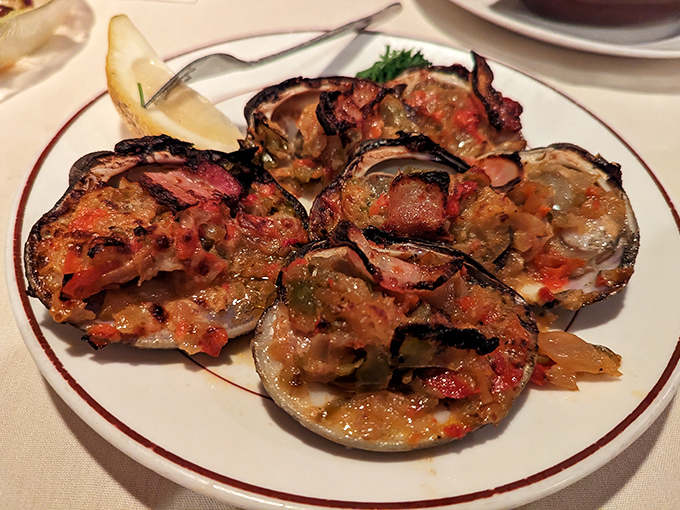 Clams casino baked to bubbling perfection, proving that some classic preparations never go out of style for good reason.