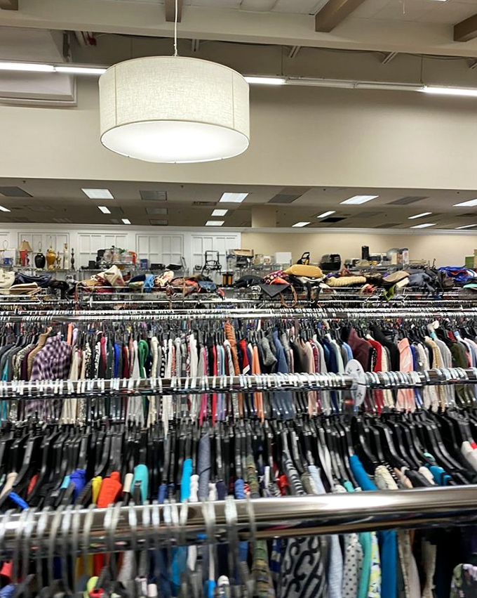 A rainbow of possibilities hanging in perfect formation. The wooden floors have witnessed countless "Does this still fit?" moments throughout the years.