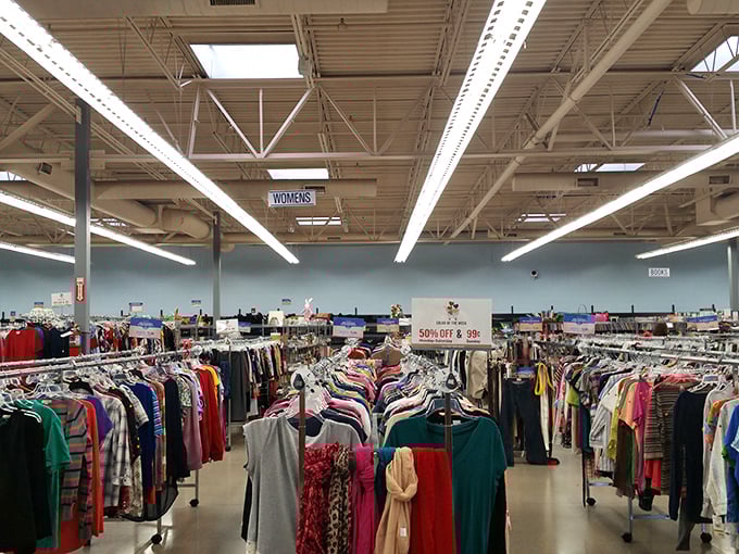 The women's section: A kaleidoscope of colors and patterns where patience rewards shoppers with designer labels at drive-thru prices.