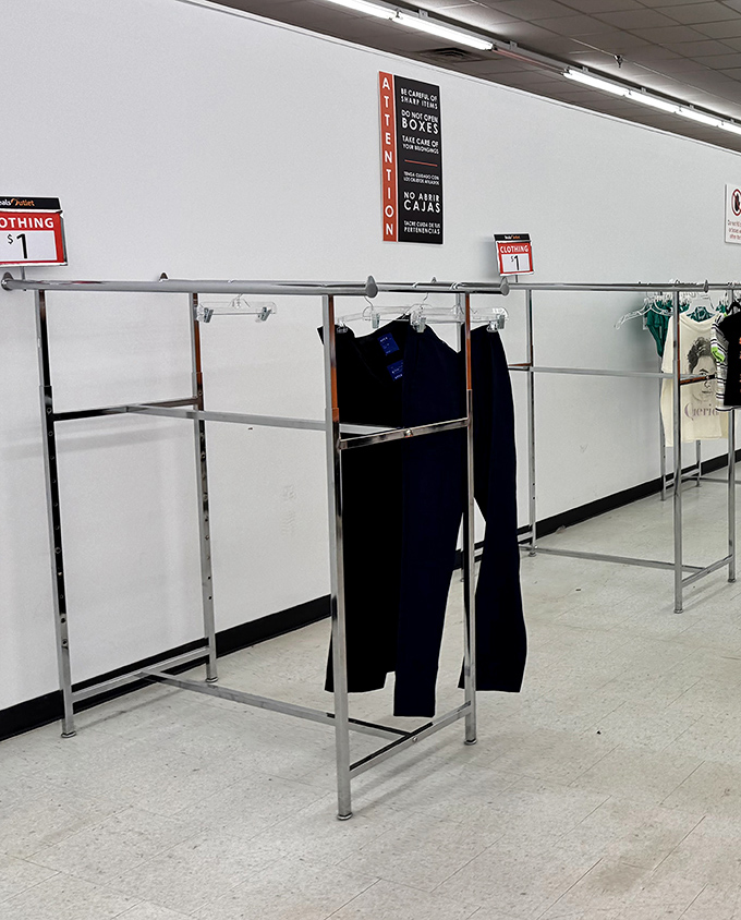The lonely pants display whispers, "Where have all the bargain hunters gone?" Don't worry&mdash;they'll be stripped bare by closing time.