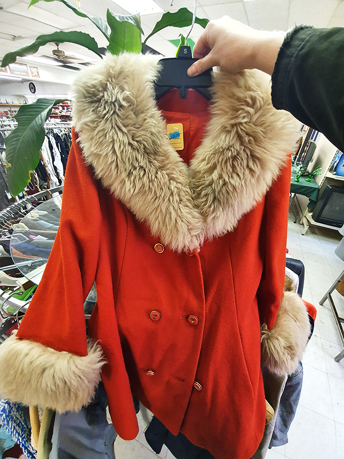 This isn't just a coat—it's a statement piece with fur trim that whispers "vintage glamour" while shouting "incredible deal!"